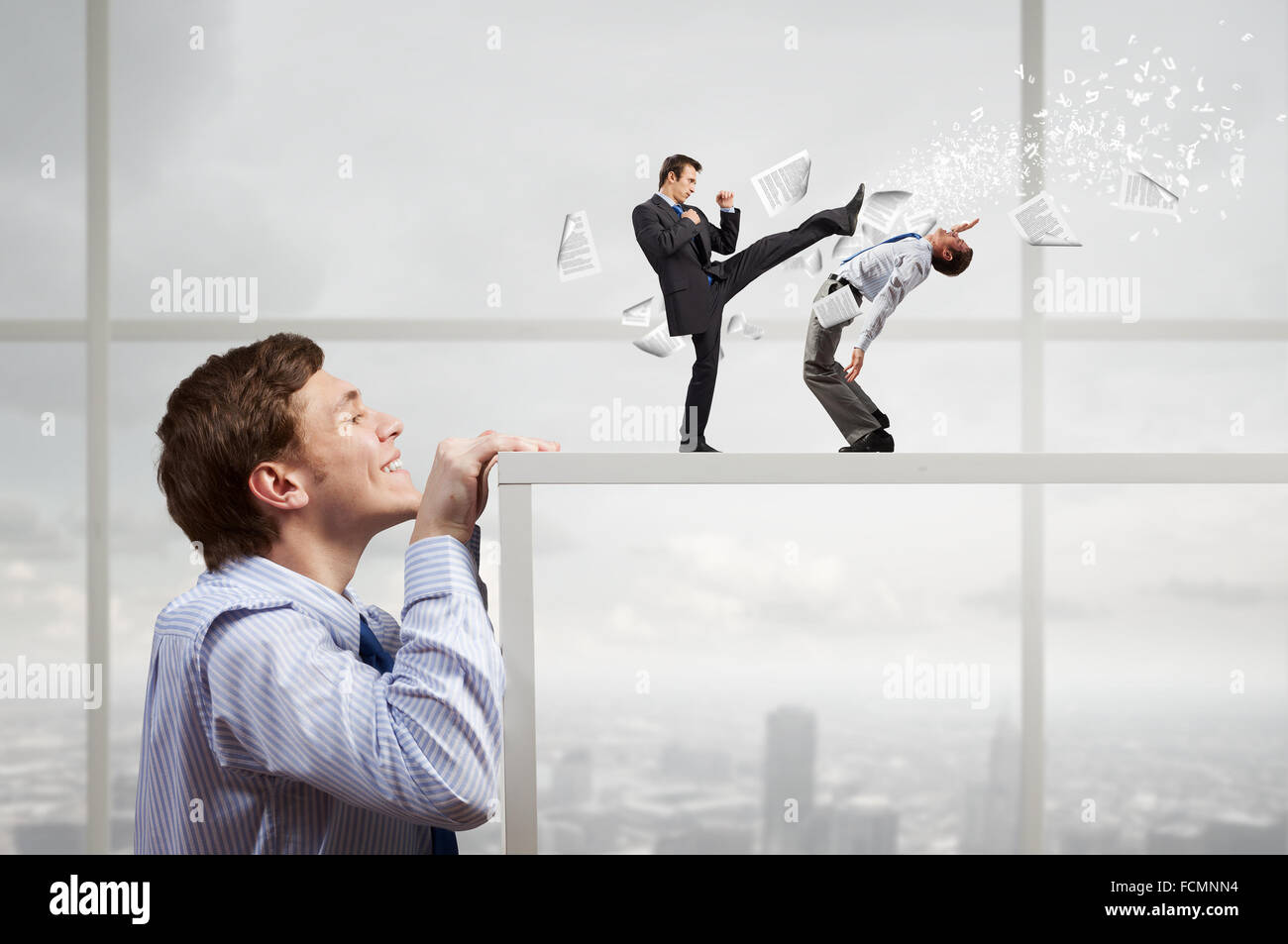 Businessman looking from under table at two fighting colleagues Stock ...
