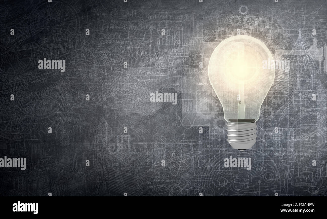 Close up of light bulb and gears mechanism Stock Photo - Alamy