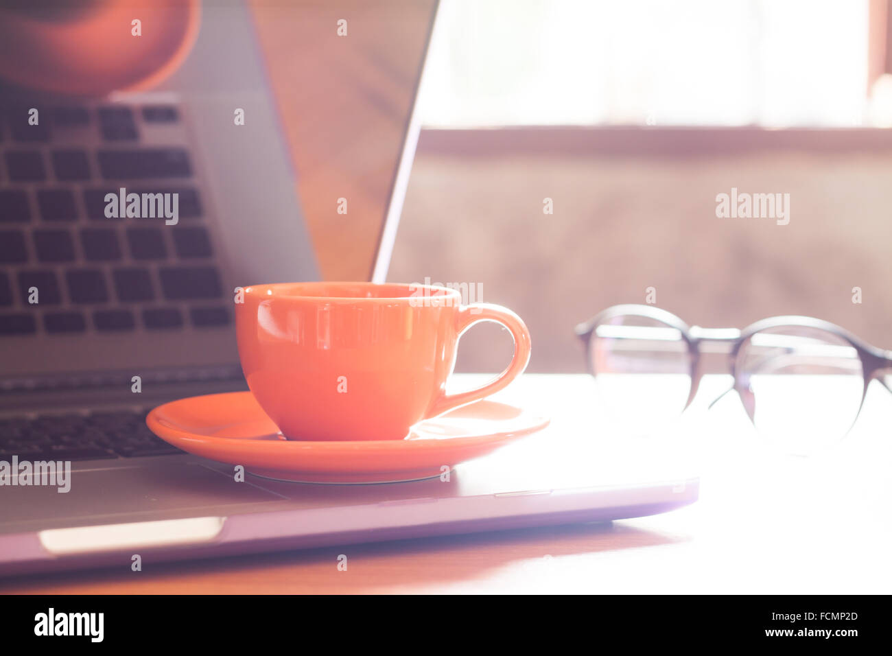 Photo of keyboard on desk hi-res stock photography and images - Alamy