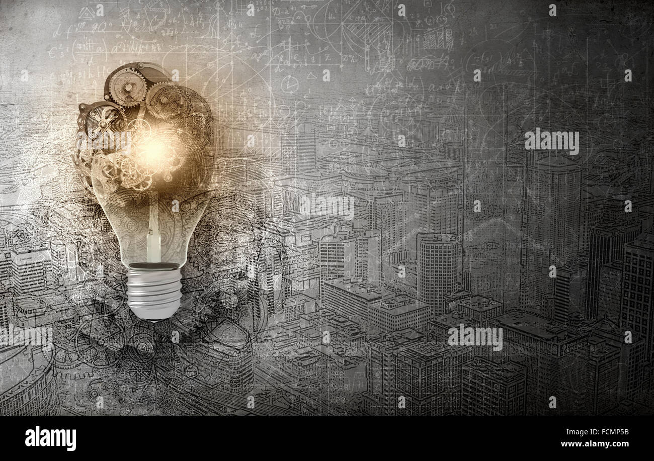 Close up of light bulb and gears mechanism Stock Photo - Alamy