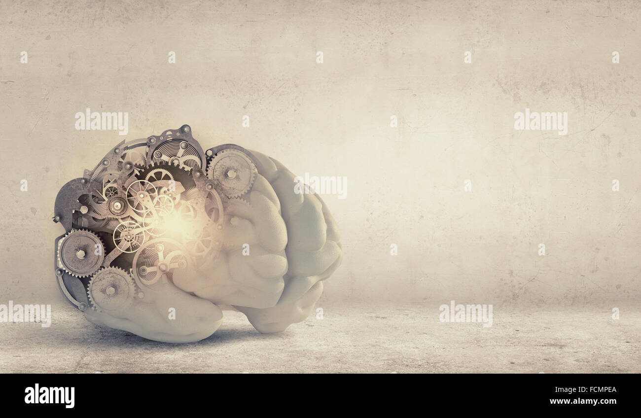Model of human brain and cogwheel mechanism Stock Photo - Alamy