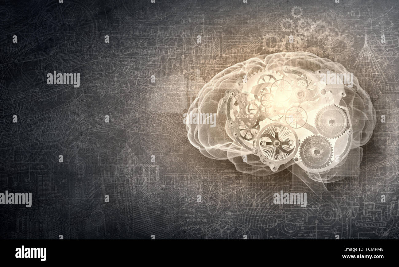 Model of human brain and cogwheel mechanism Stock Photo - Alamy
