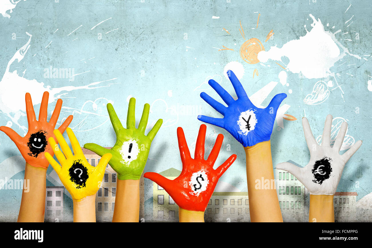 Human hands in colorful paint showing symbols Stock Photo - Alamy