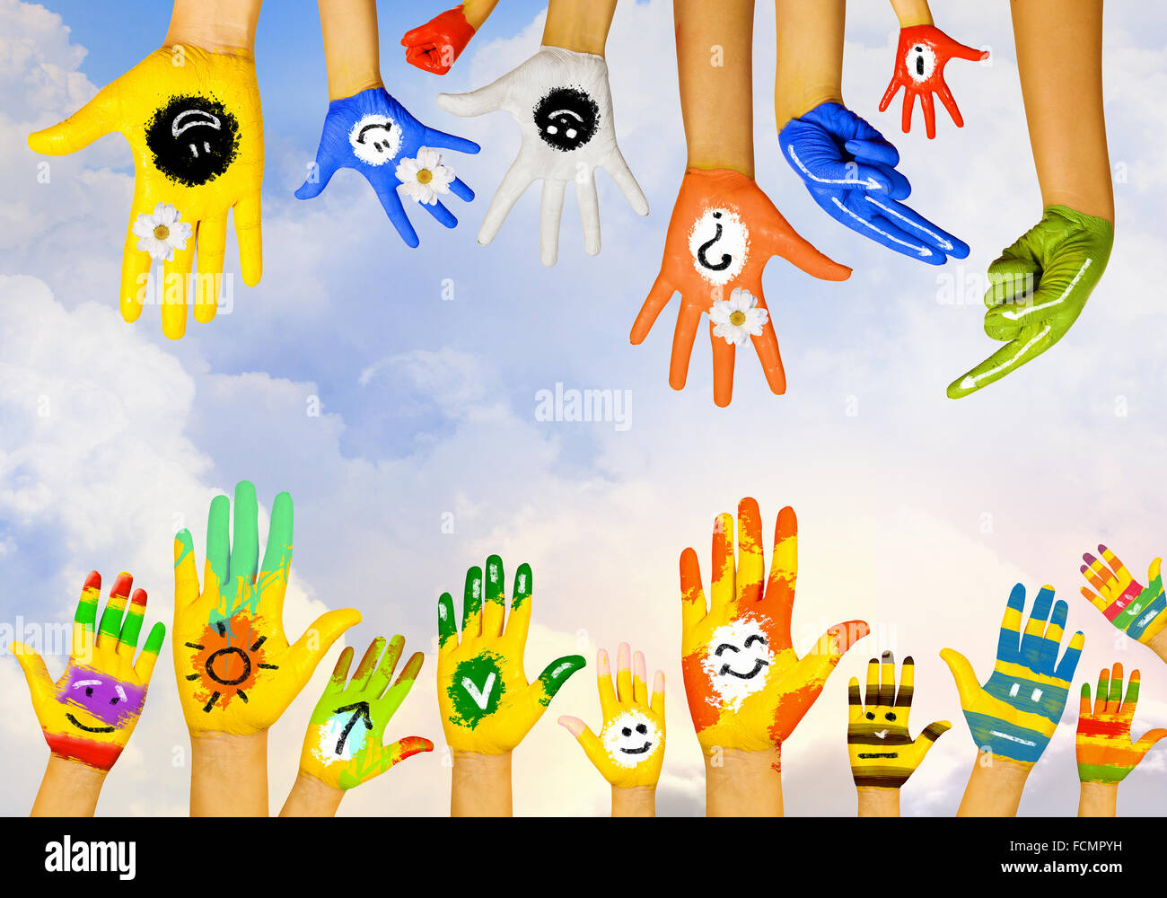Human hands in colorful paint showing symbols Stock Photo - Alamy