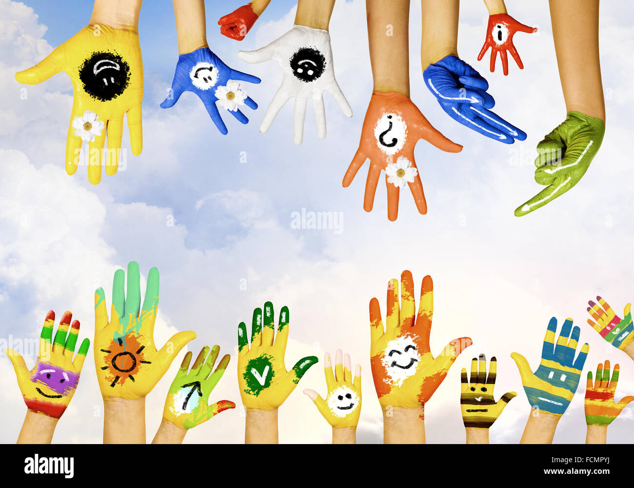 Human hands in colorful paint showing symbols Stock Photo - Alamy