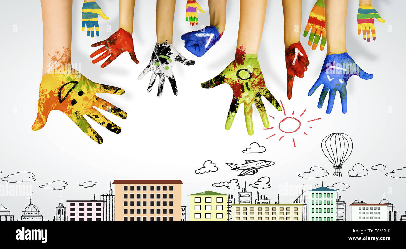 Human hands in colorful paint showing symbols Stock Photo - Alamy