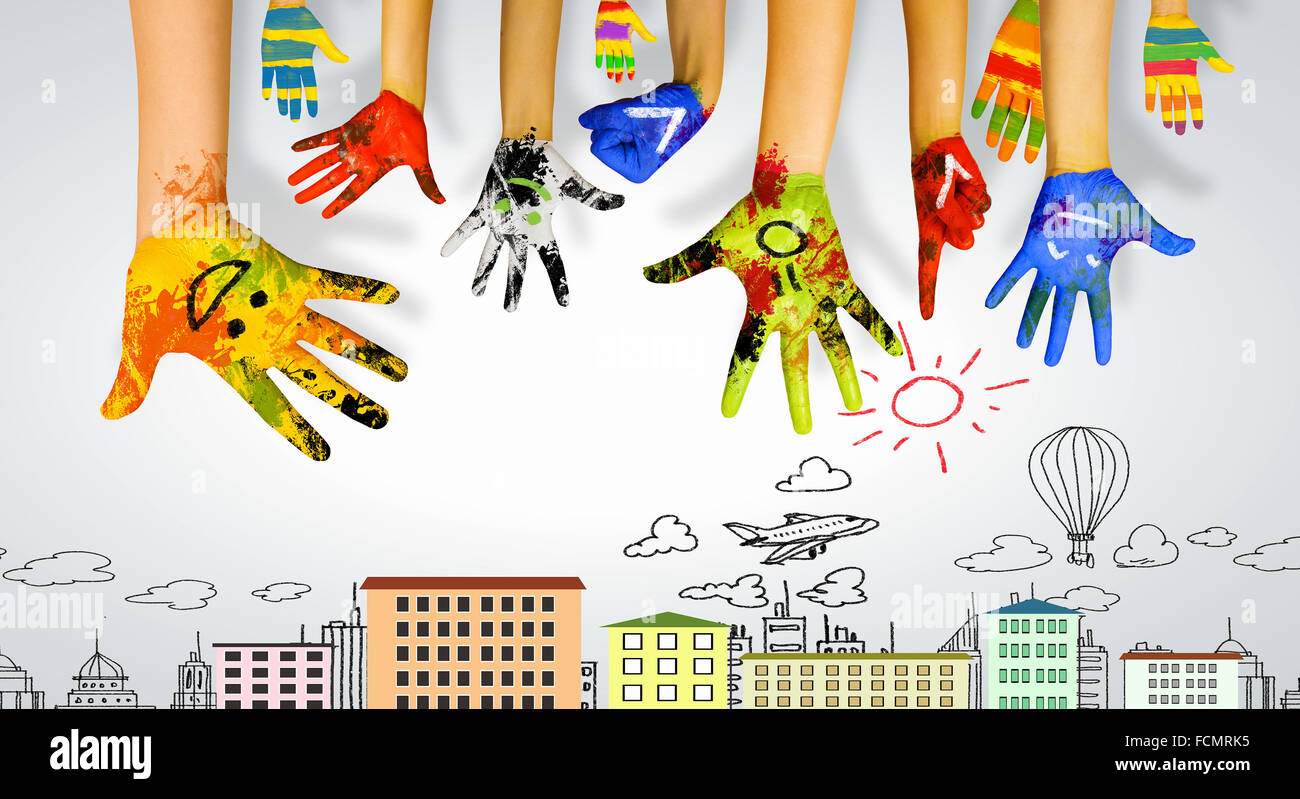 Human hands in colorful paint showing symbols Stock Photo - Alamy