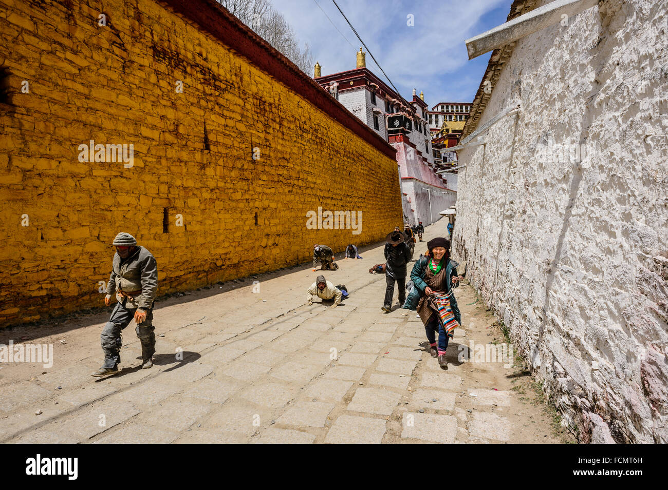 Prostrating and praying Stock Photo - Alamy
