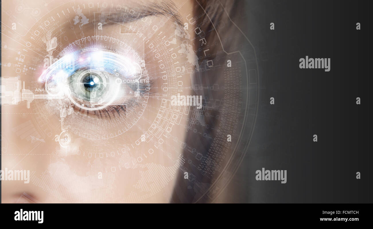 Woman scanning eye in digital hi-res stock photography and images - Alamy