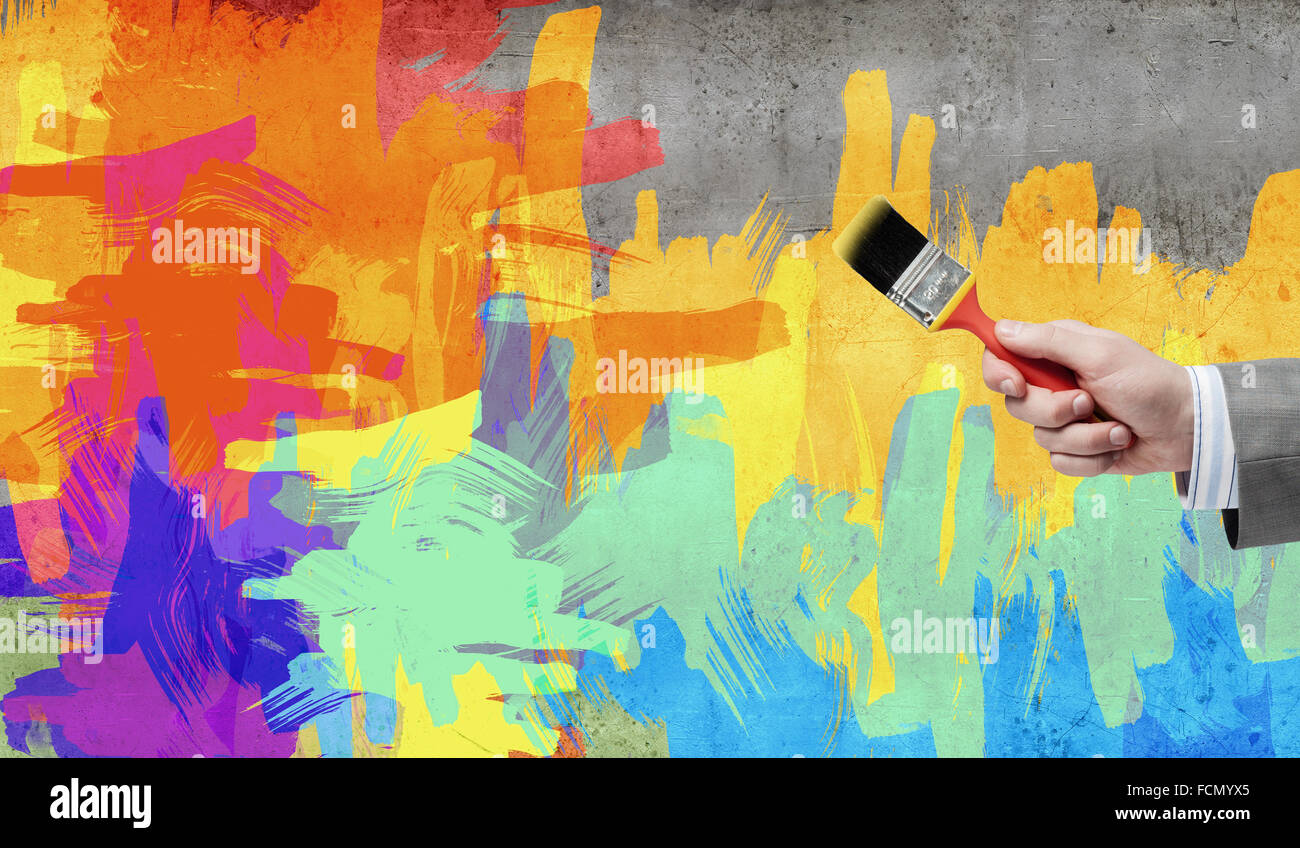 Hand painting wall in hi-res stock photography and images - Alamy
