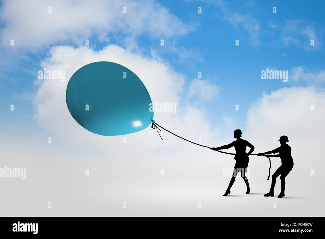 Little silhouettes of people pulling rope with balloon Stock Photo - Alamy