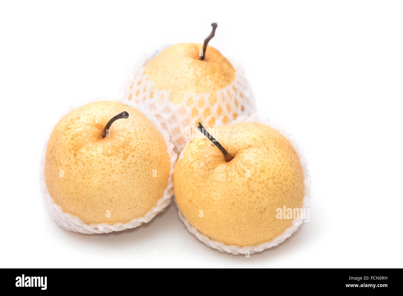 Chinese pear nashi isolated on white background Stock Photo - Alamy