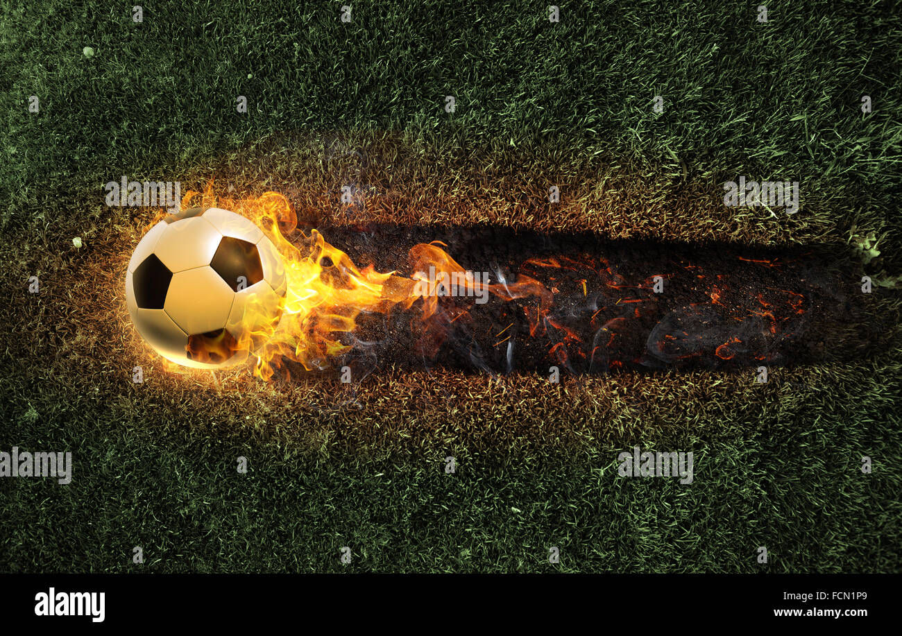 Conceptual image of football ball in fire flames Stock Photo - Alamy