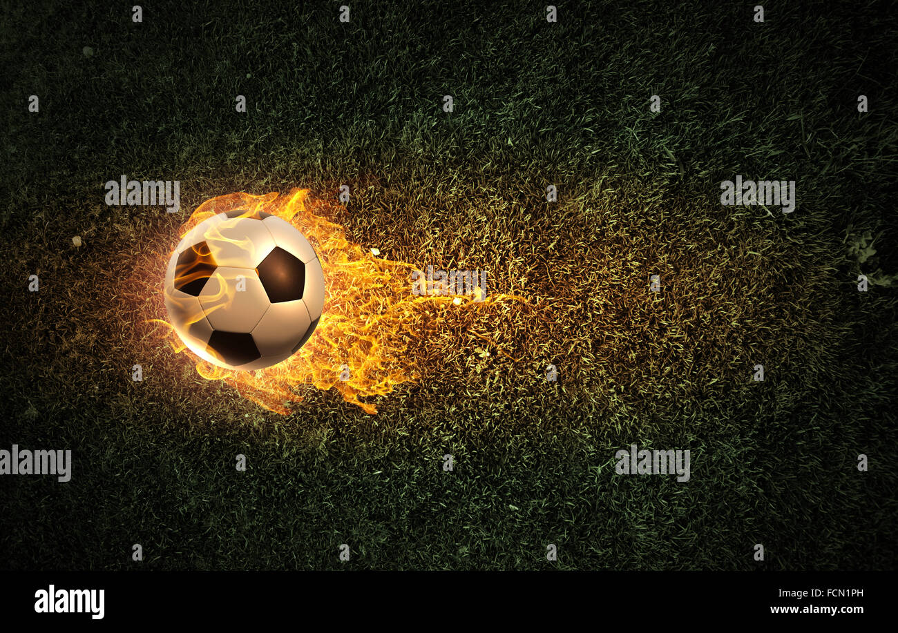 Conceptual image of football ball in fire flames Stock Photo - Alamy