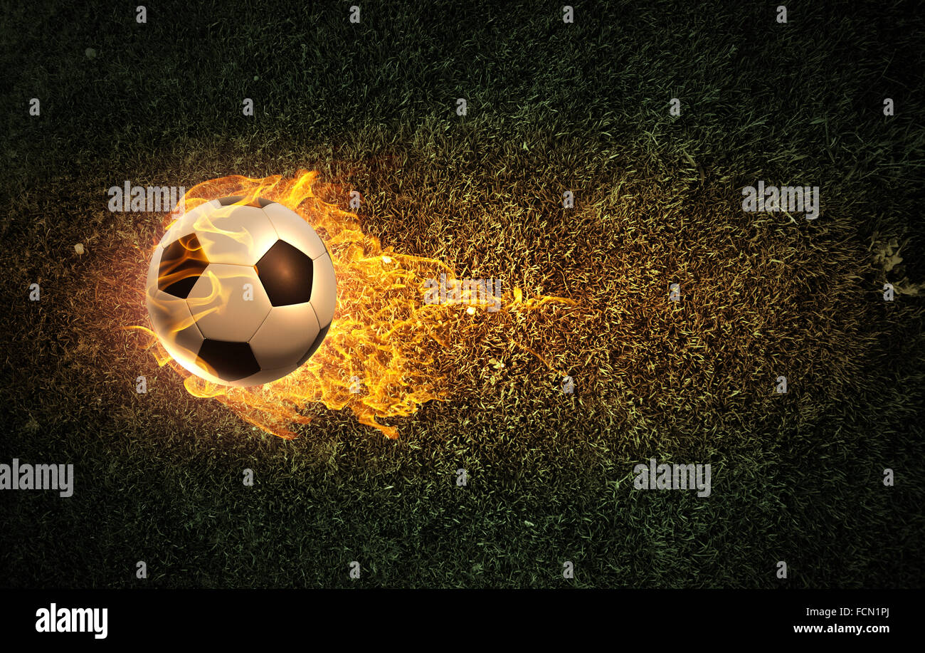Conceptual image of football ball in fire flames Stock Photo - Alamy