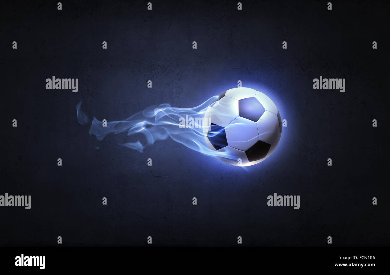 Conceptual image of football ball in fire flames Stock Photo - Alamy
