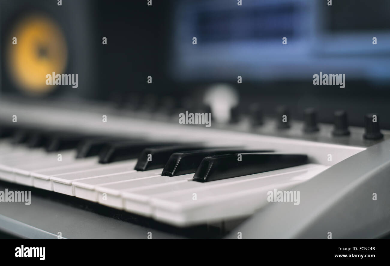 Midi keyboard. Home recording studio with professional monitors Stock ...