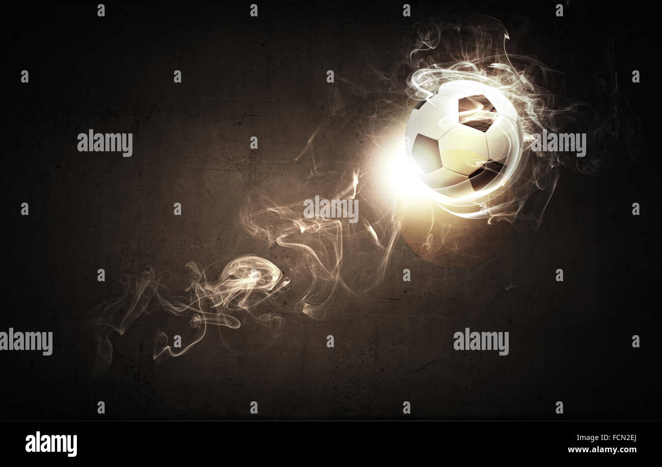 Conceptual image of football ball in fire flames Stock Photo - Alamy