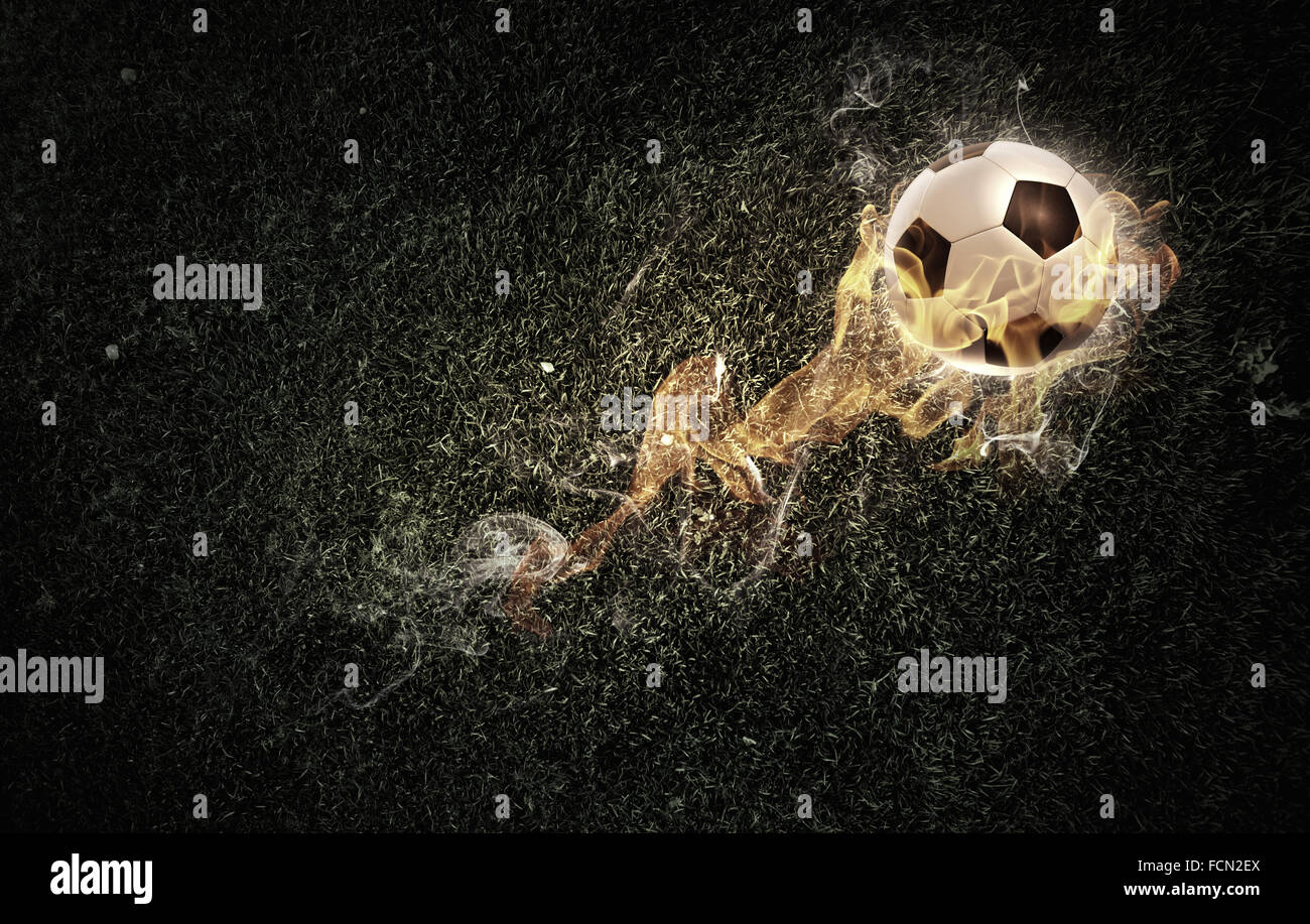 Conceptual image of football ball in fire flames Stock Photo - Alamy