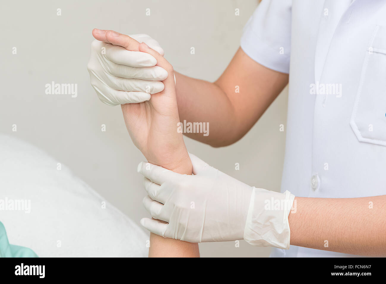 Physical therapist doing hand exercise after injury hand Stock Photo ...