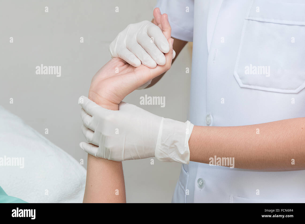 Physical therapist doing hand exercise after injury hand Stock Photo ...