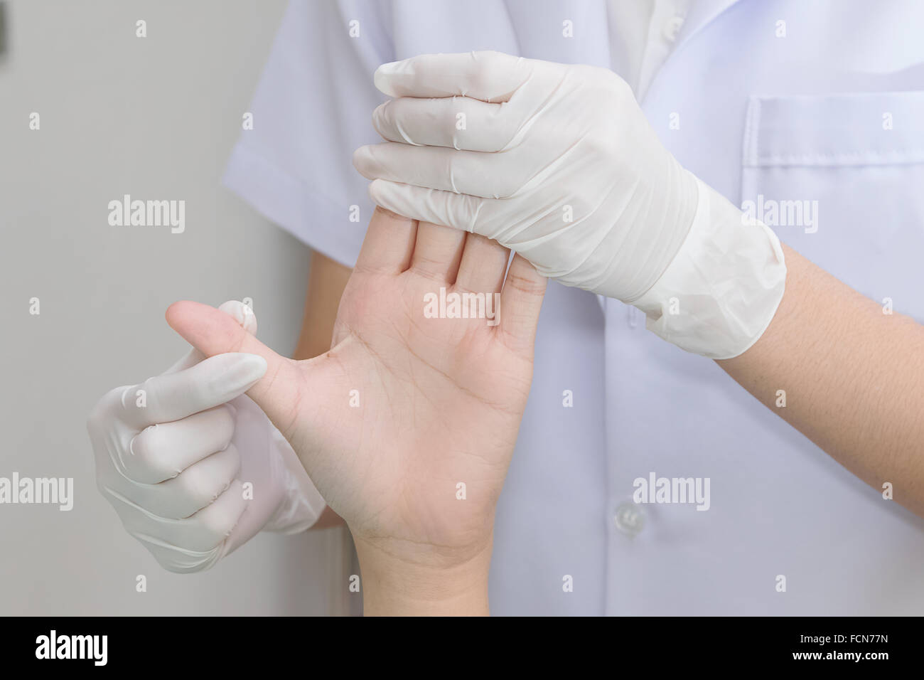 Physical therapist doing hand exercise after injury hand Stock Photo ...