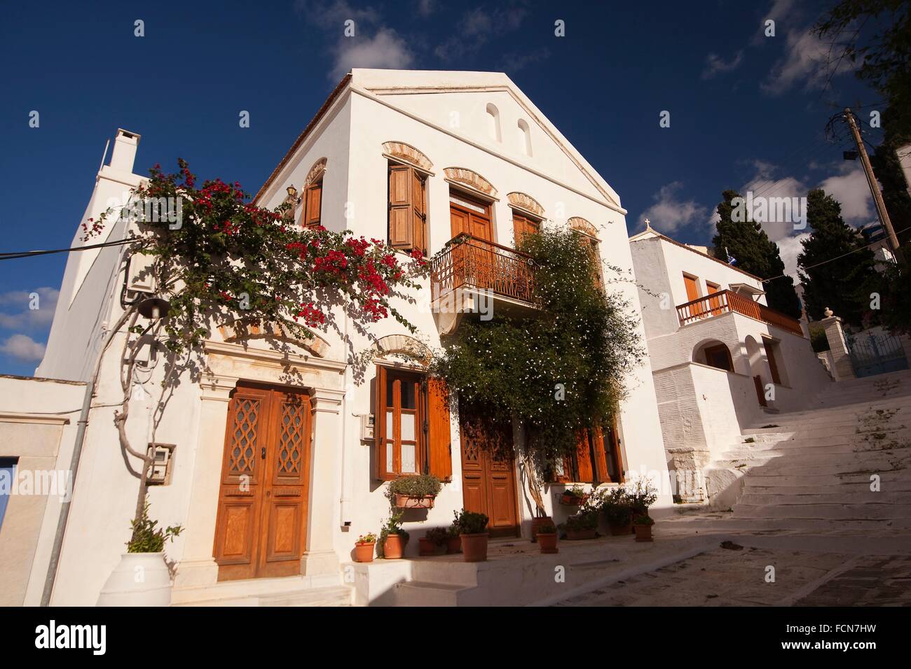 Whitewashed house with colorful door and windows in Pyrgos village ...