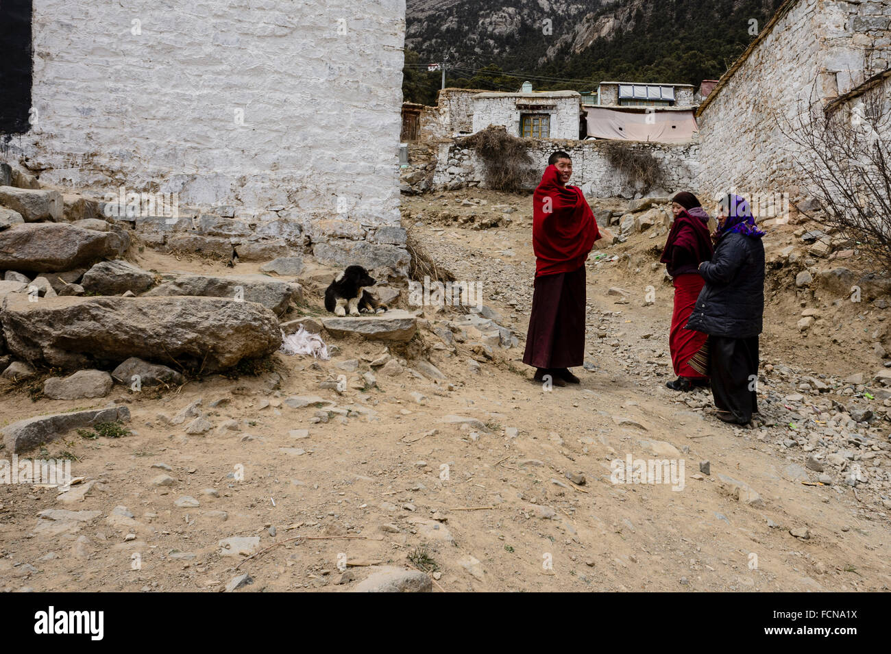 Chatting around the monastery Stock Photo - Alamy