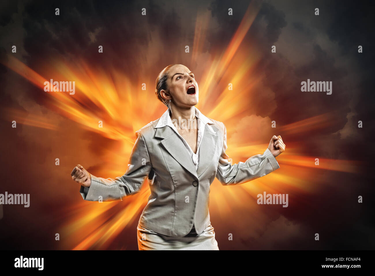 businesswoman in anger screaming standing in flash of light Stock Photo ...