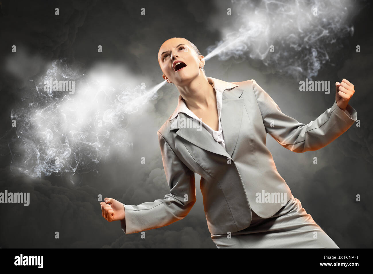 businesswoman in anger screaming steam going out from ears Stock Photo ...