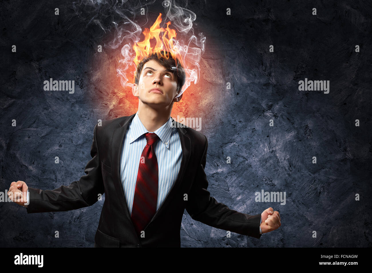 businessman in anger with fists clenched screaming Stock Photo - Alamy