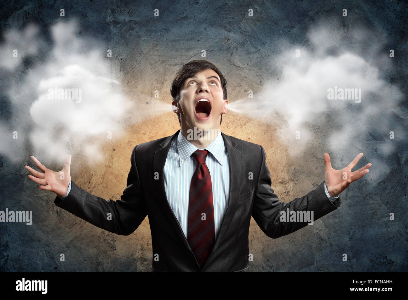 businessman in anger screaming puff going out from ears Stock Photo - Alamy