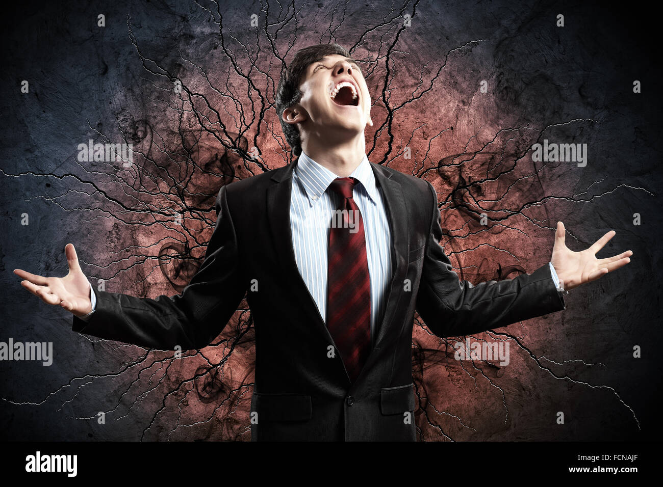 businessman in anger with fists clenched screaming Stock Photo - Alamy