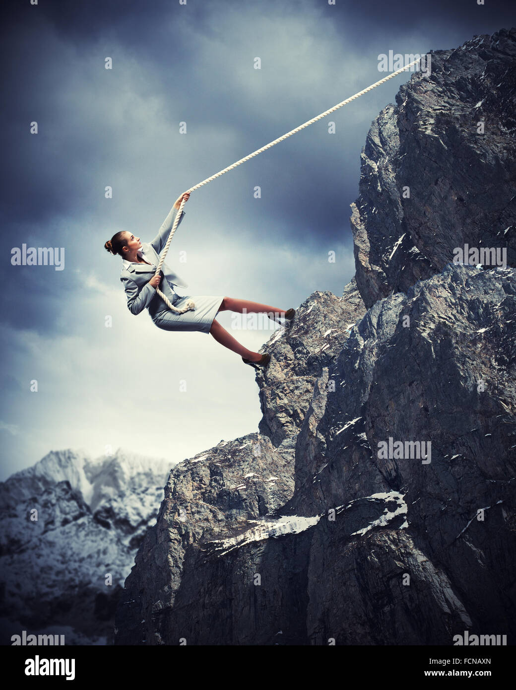 Businesswoman standing mountain top hi-res stock photography and images ...
