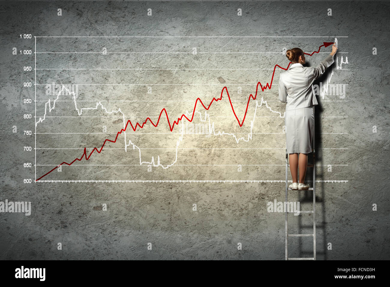 Businesswoman standing on ladder drawing hi-res stock photography and ...