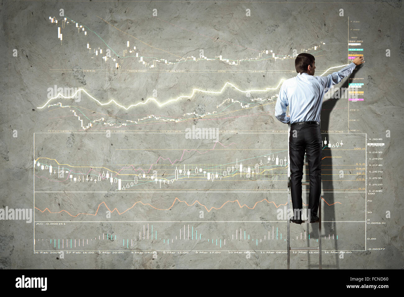 businessman standing on ladder drawing diagrams and graphs Stock Photo ...