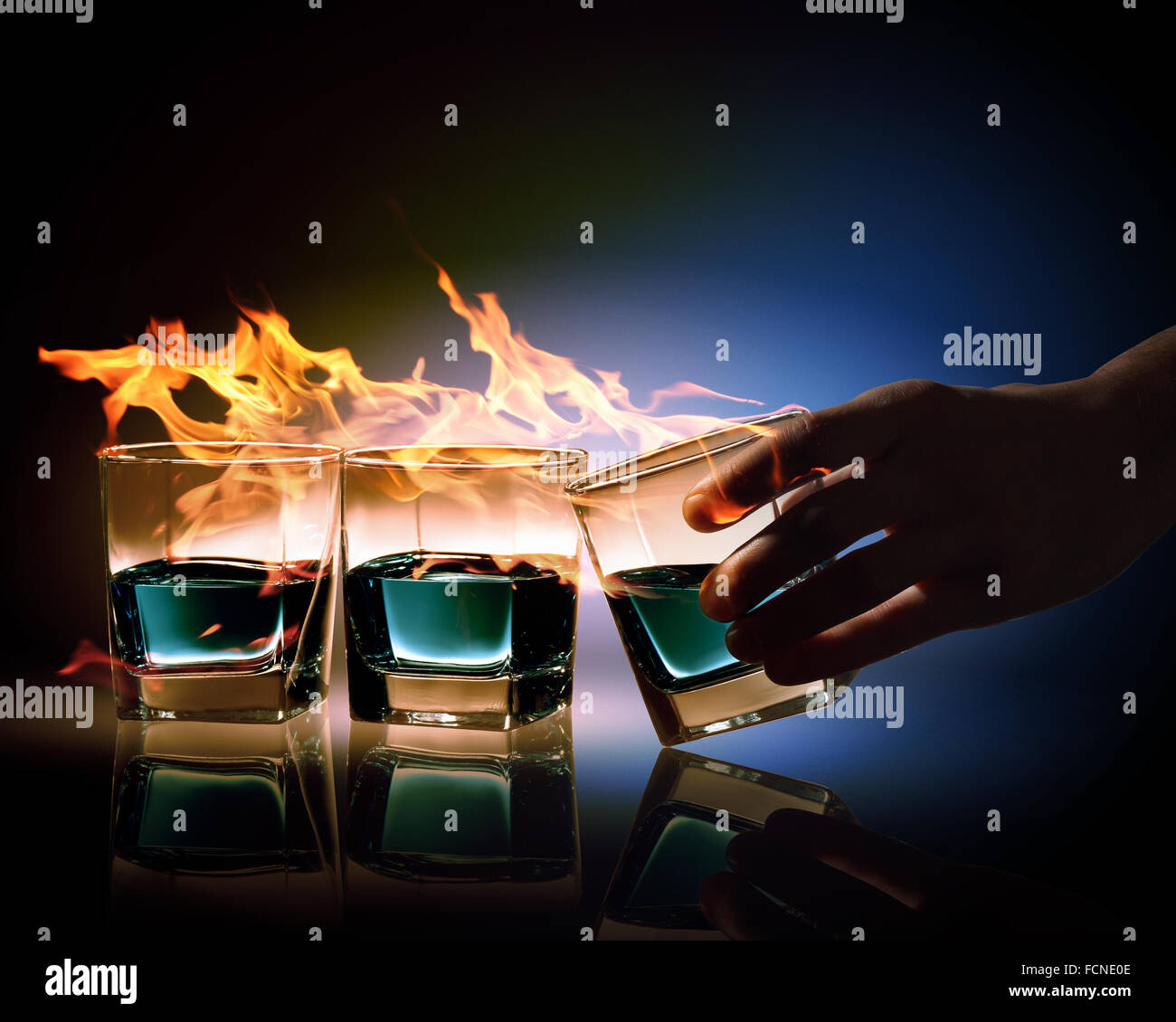 Image of three glasses of burning emerald absinthe Stock Photo - Alamy