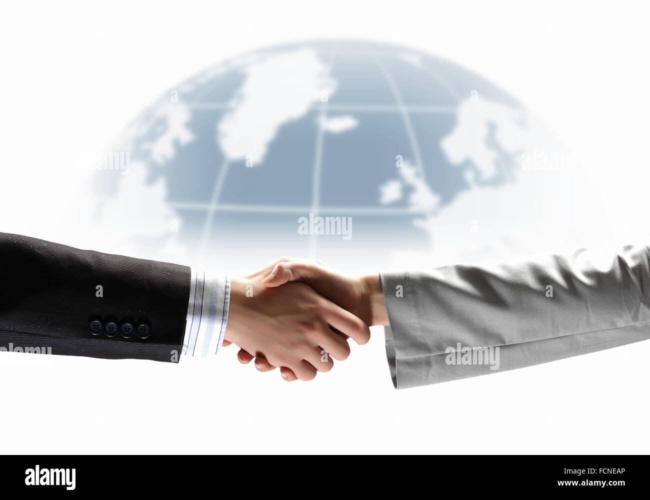 business handshake against white background with globe image Stock ...