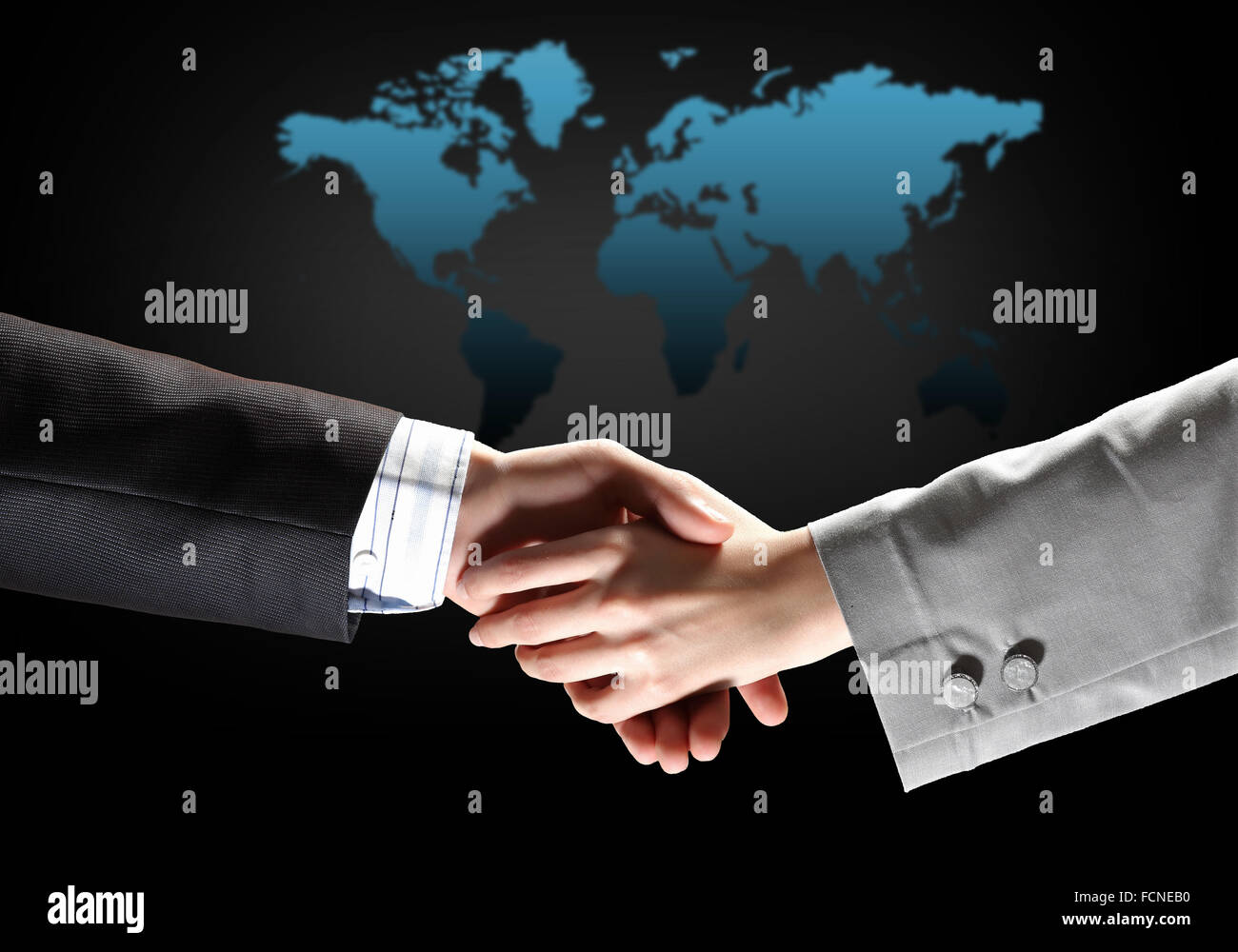 business handshake against black background with map image Stock Photo ...