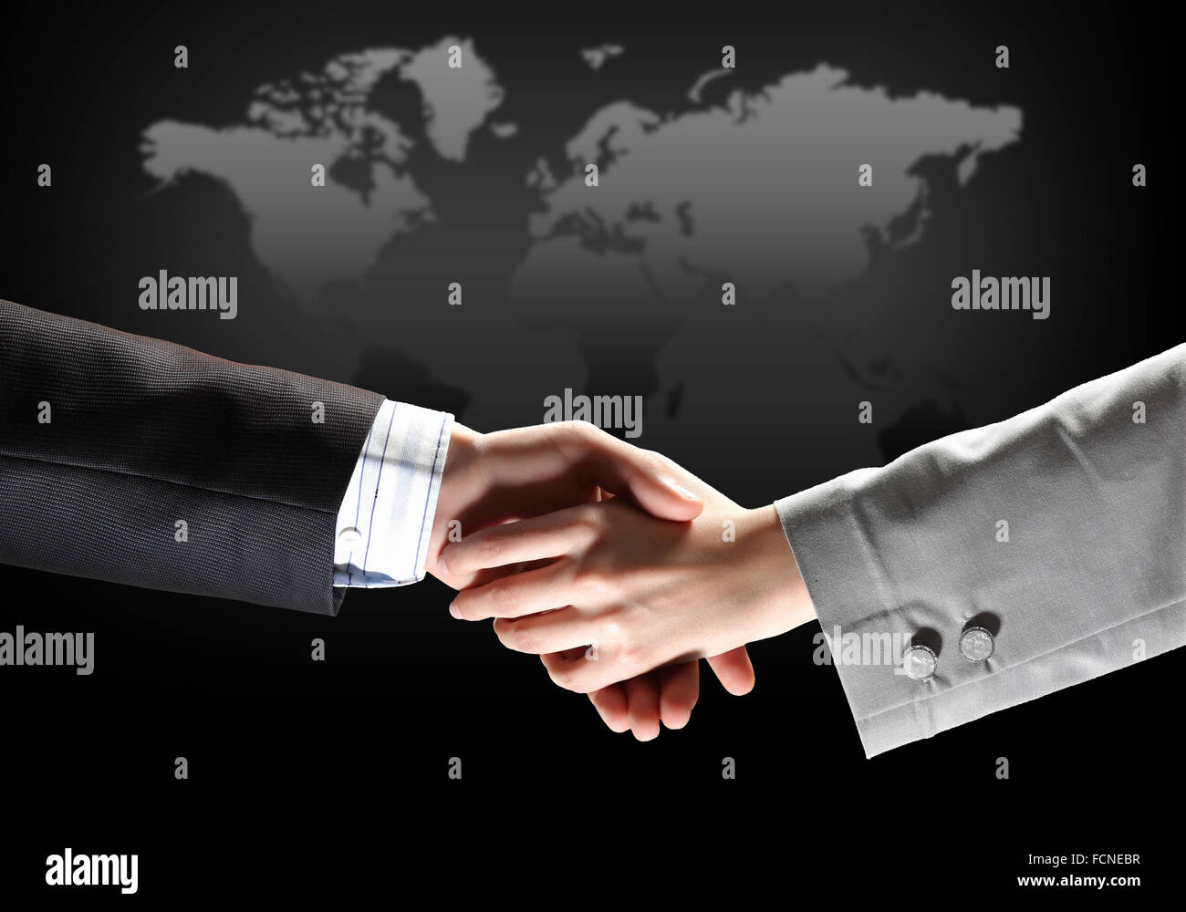 business handshake against black background with map image Stock Photo ...