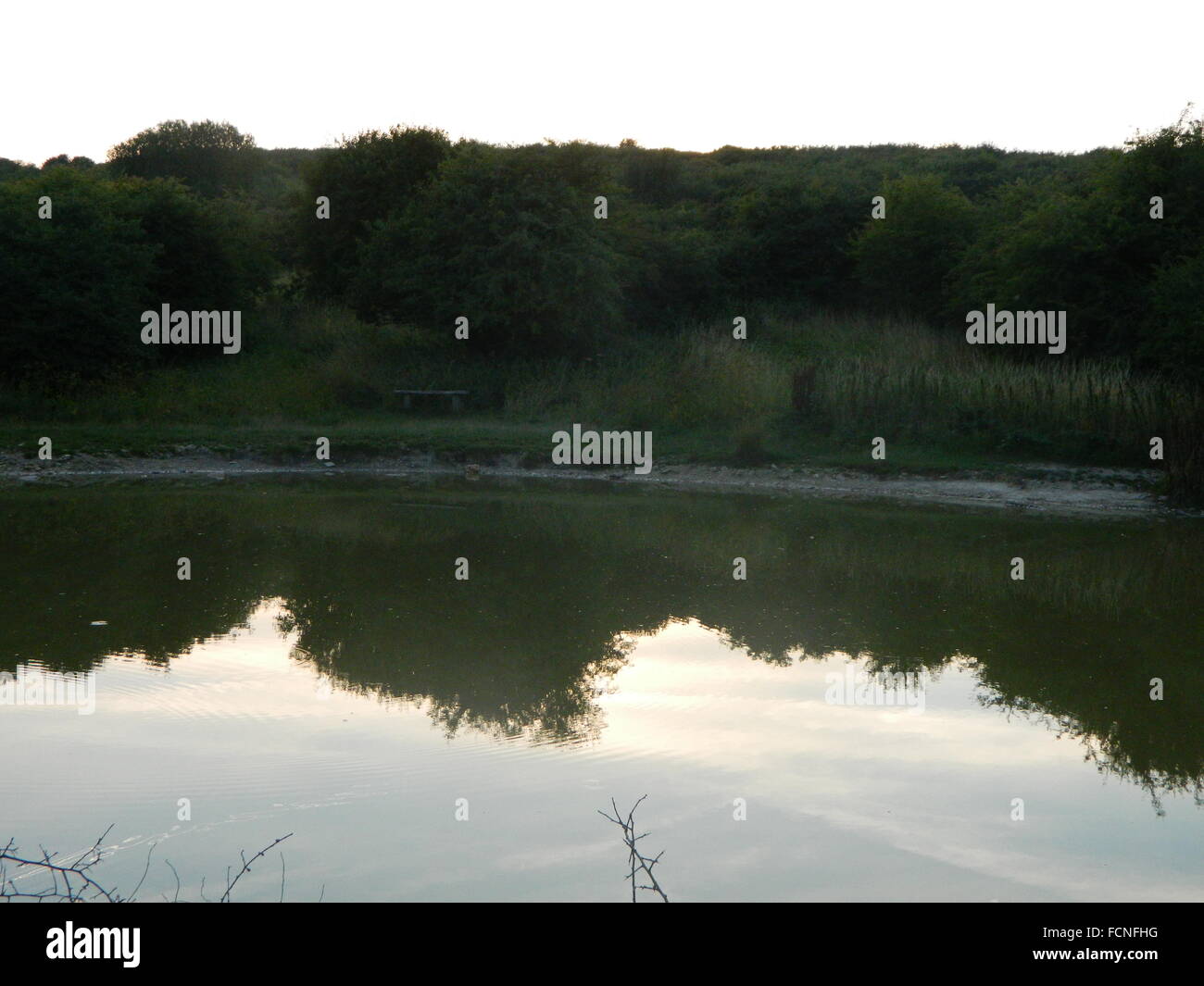 sunset in water Stock Photo - Alamy