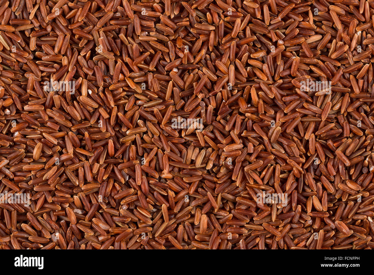 close up of background of raw red rice Stock Photo - Alamy