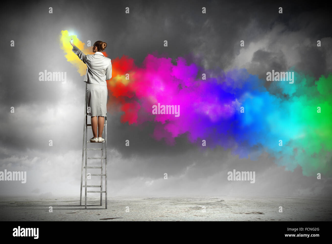 Woman standing on ladder drawing hi-res stock photography and images ...