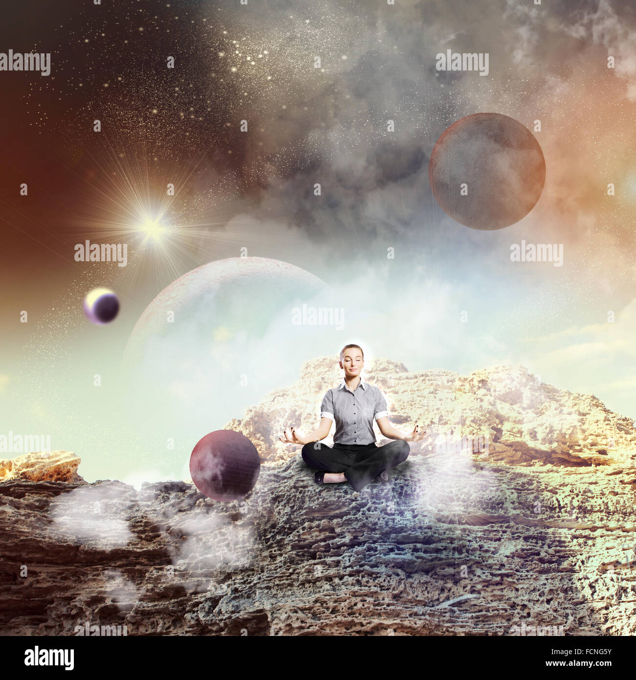 Businesswoman sitting in lotus flower position against space background ...
