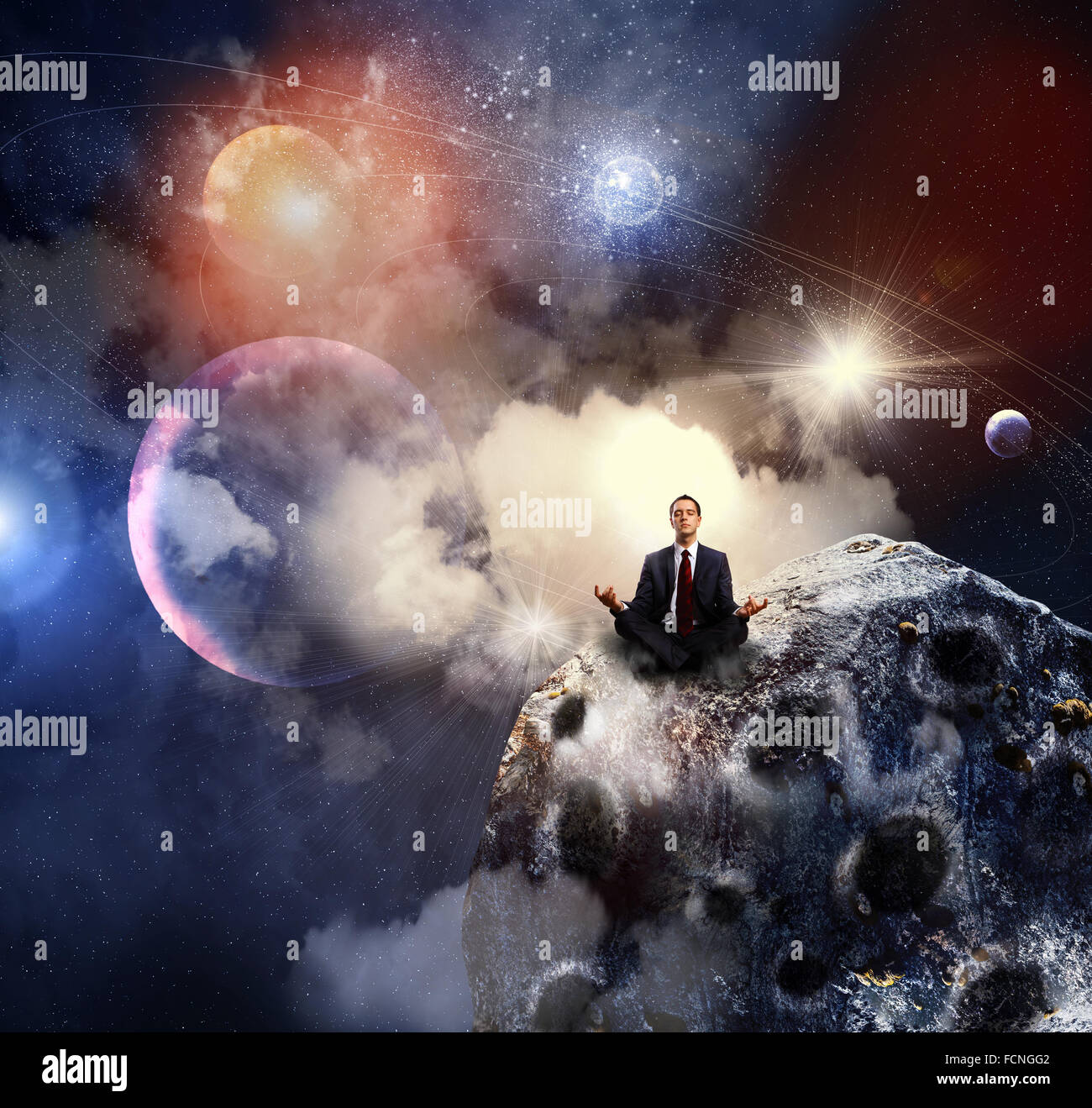 Businessman sitting in lotus flower position against space background ...