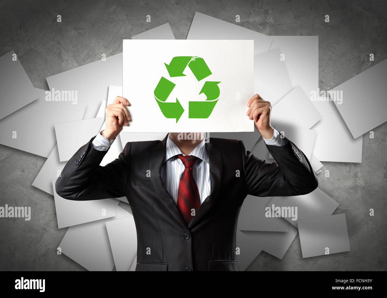 Image of man holding board with recycling sign Stock Photo - Alamy