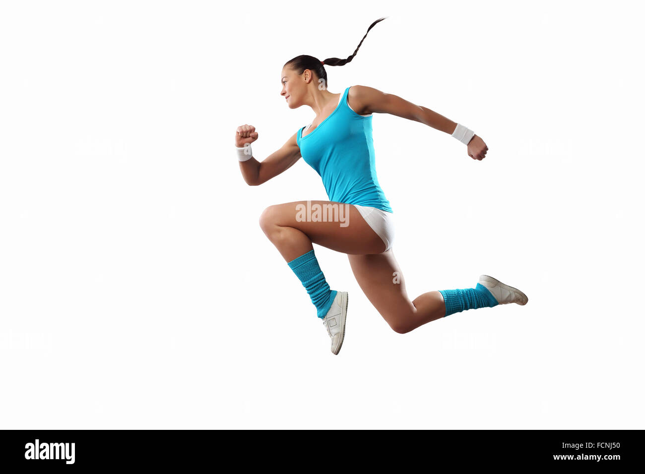 Image of sport girl in jump against white background Stock Photo - Alamy