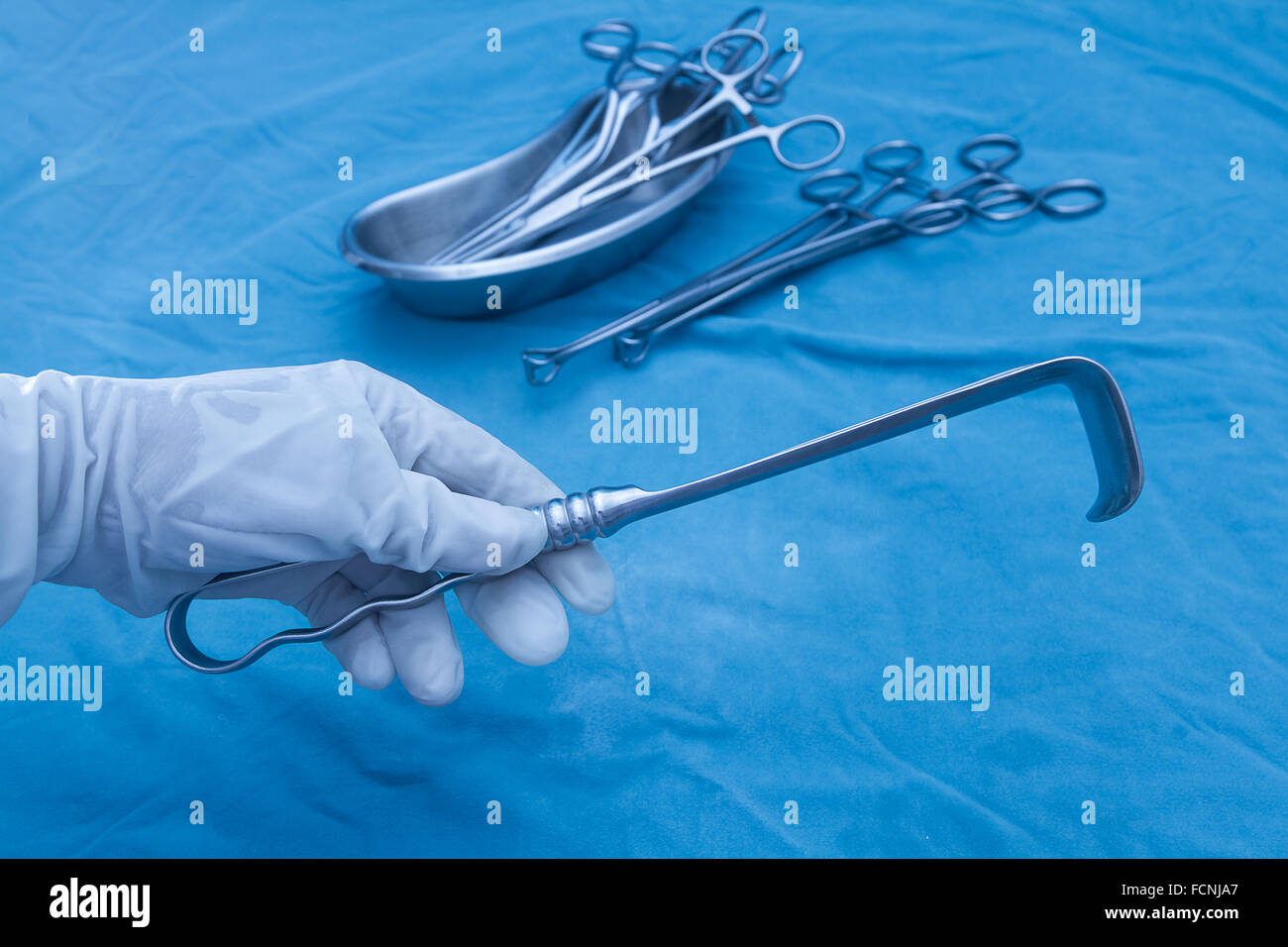 hand grabbing Sterile surgery instruments Stock Photo - Alamy