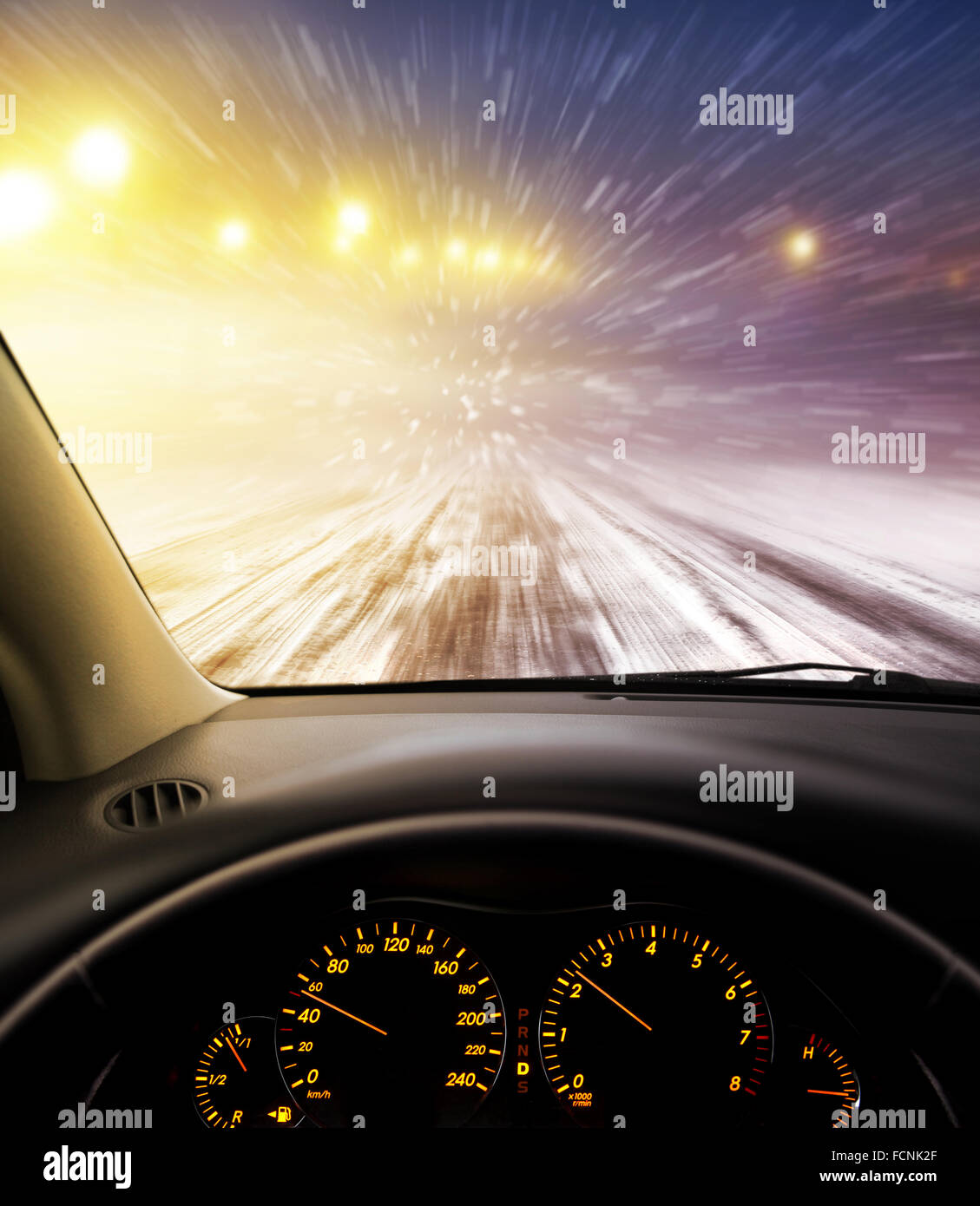 view through car windshield to snow-covered road Stock Photo - Alamy