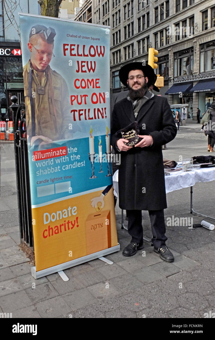 A religious Jewish man encourages other Jews to wear phylacteries ...